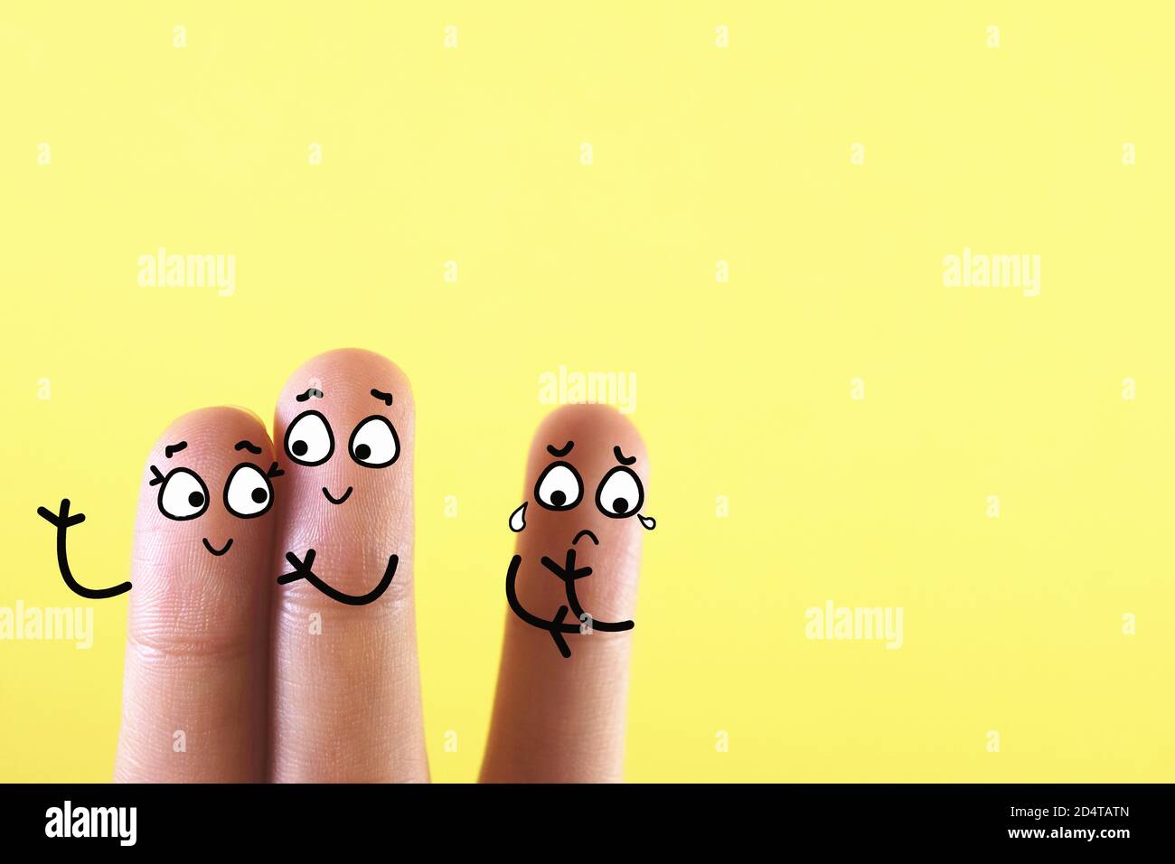 Three fingers are decorated as three person. One of them is suffering ...