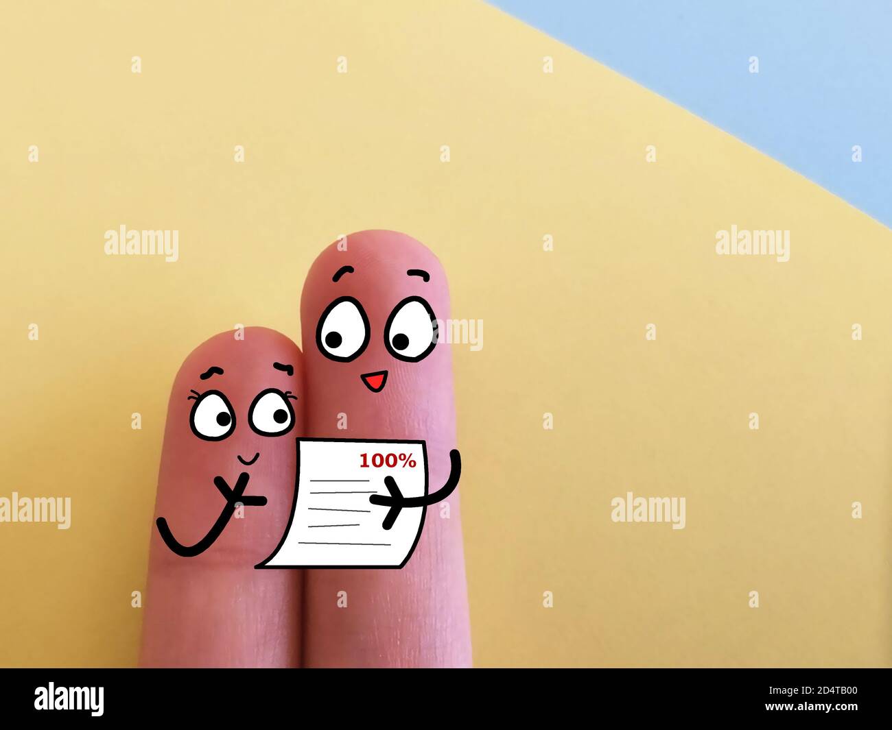 Two fingers are decorated as two person. One of them is doing well in ...