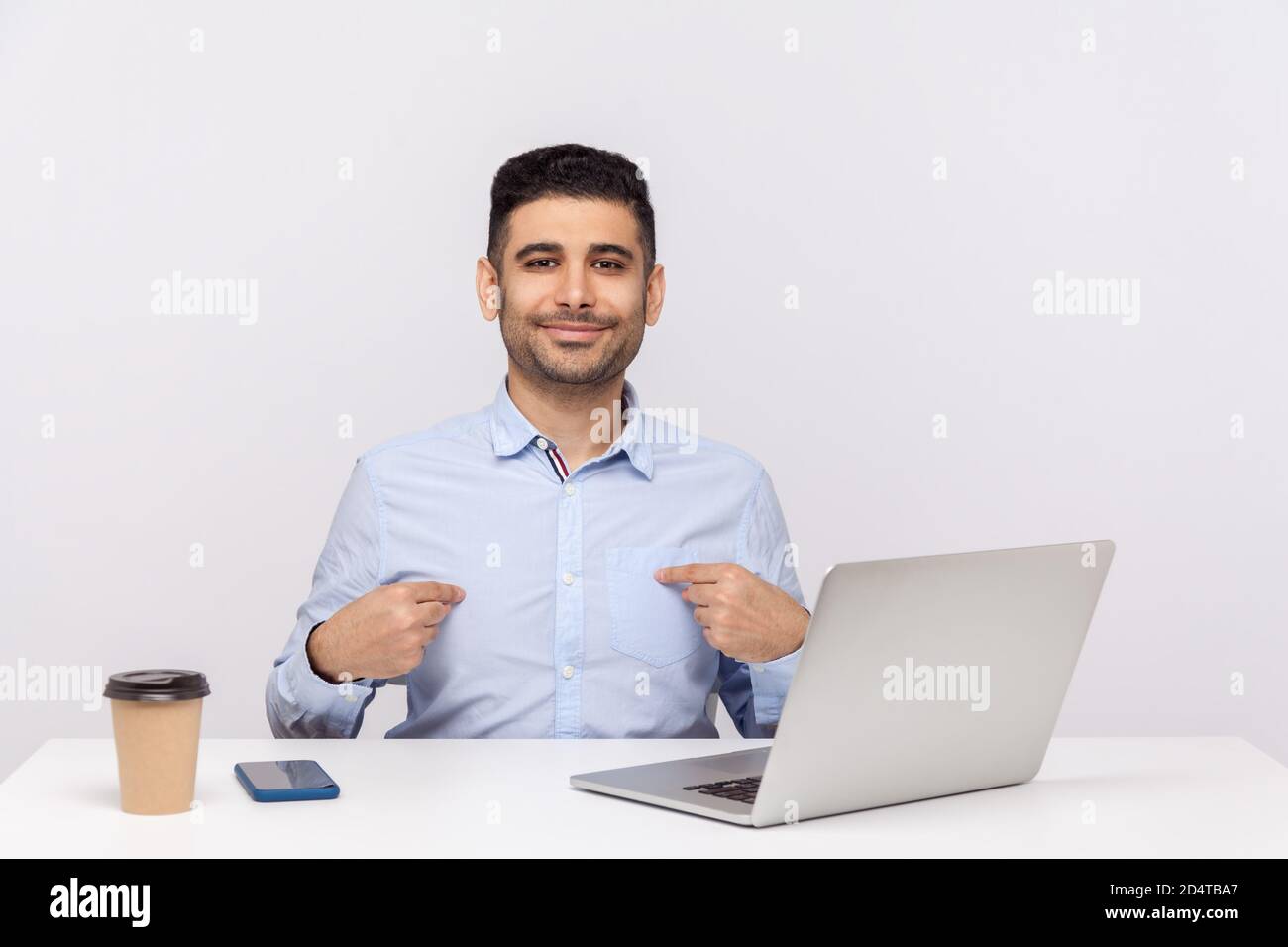 This is me! Happy successful man employee sitting office workplace with ...