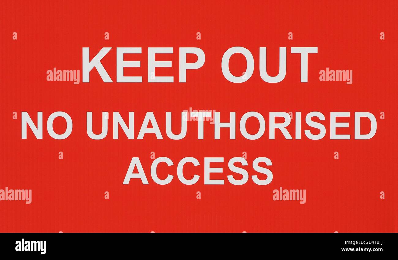 keep out no unauthorised access warning sign Stock Photo - Alamy