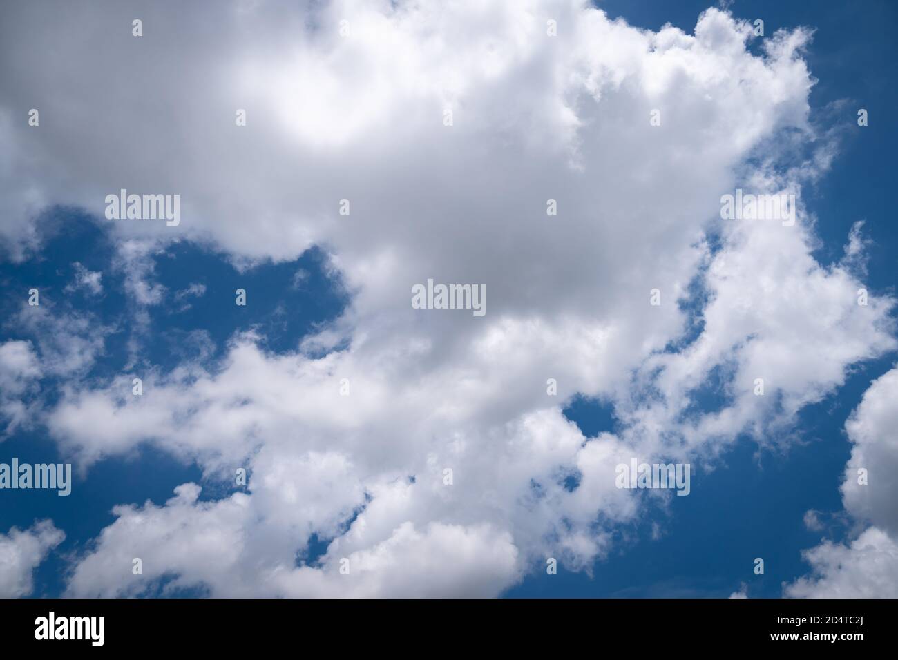 The blue sky with moving white clouds. The most of clouds are beautiful ...