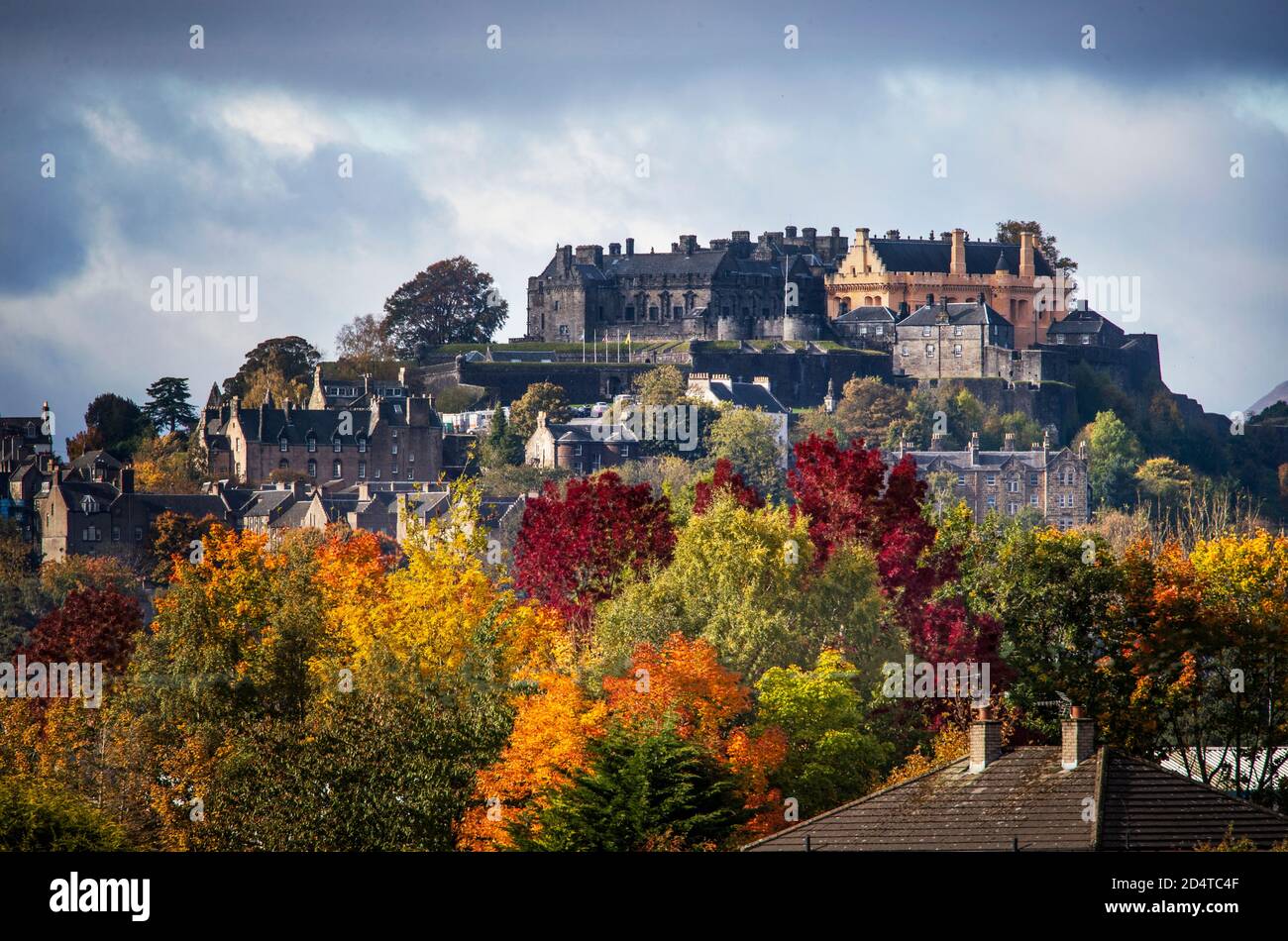 Stirling Castle surrounded by trees displaying their Autumn colours ...