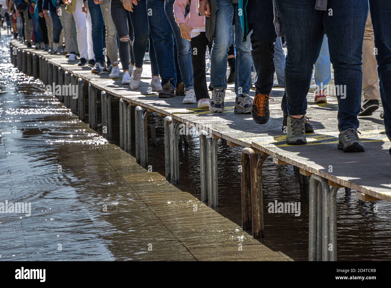 people walking on ramp during flood in venice Stock Photo - Alamy