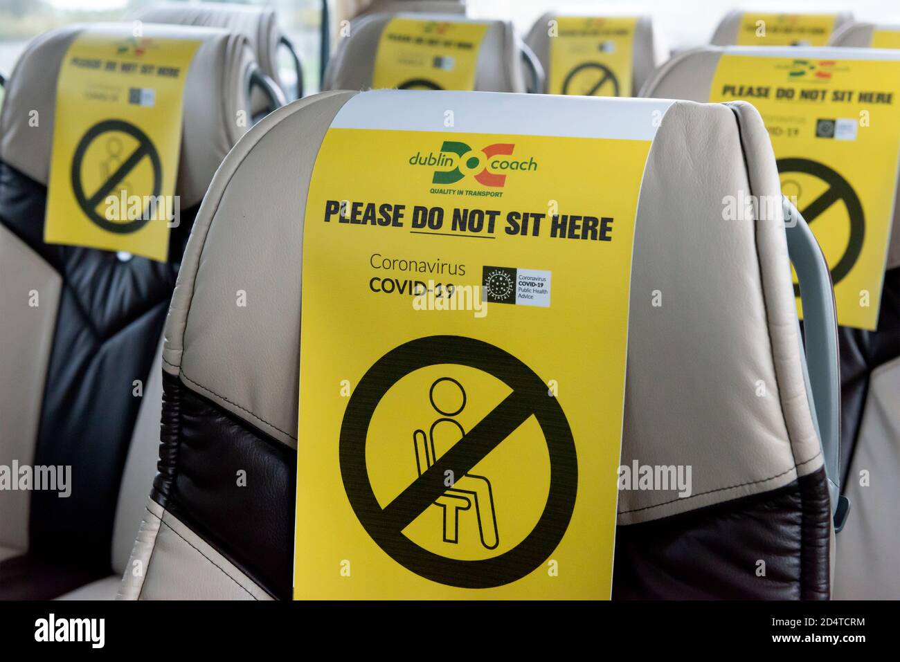 Social distancing yellow sign on seats due to Covid 19 pandemic inside ...