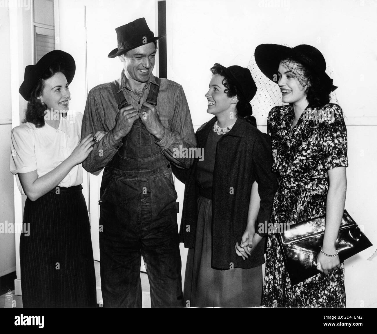 GARY COOPER and JOAN LESLIE on set candid with Joan Leslie's two ...