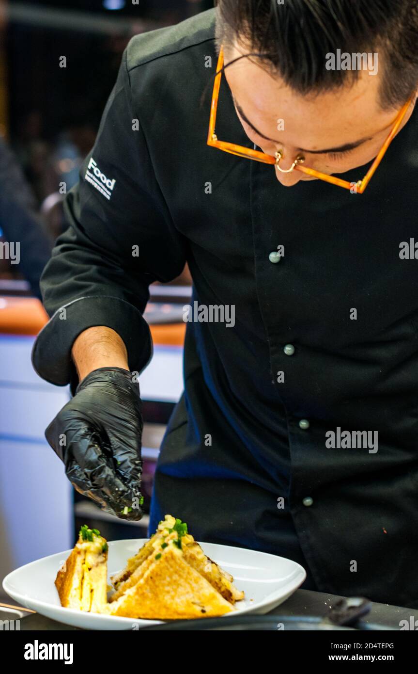 Chef Andrew Moo cooking egg and plant chorizo grilled cheese at the ...