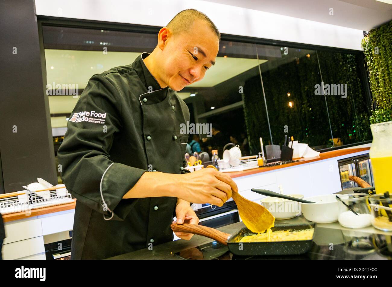 Chef Brian Tan cooking mushroom frittata at the Future Food Studio by ...