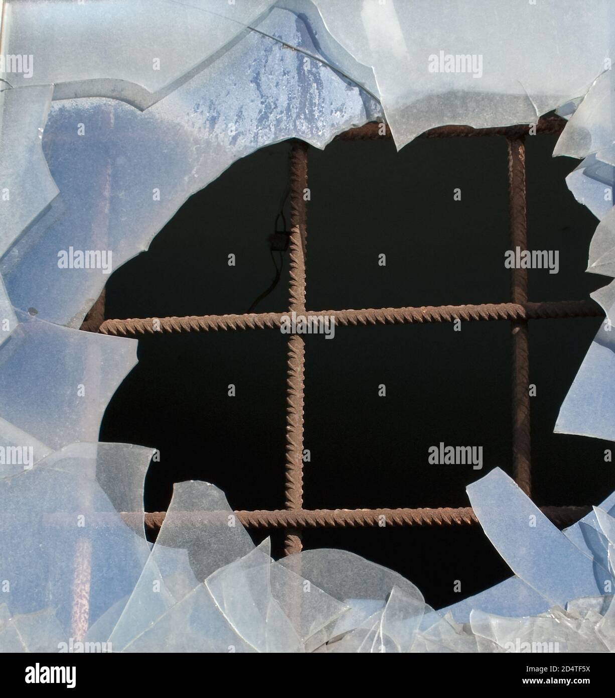 Rusted iron bars and broken glass window Stock Photo - Alamy