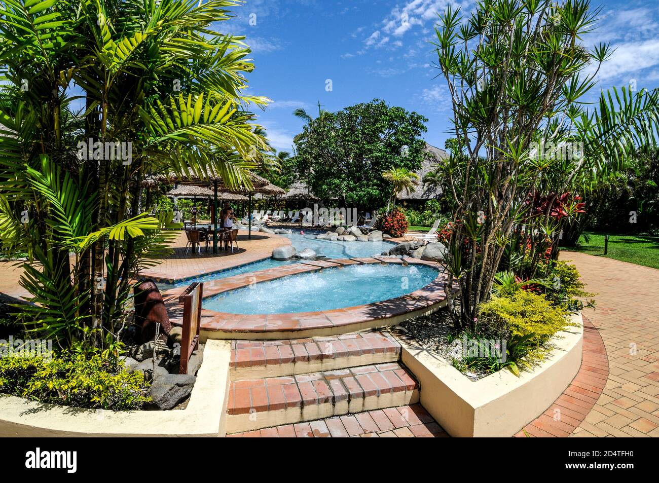 A Jacuzzi pool next to the main swimming pool at the Outriggers Fiji ...