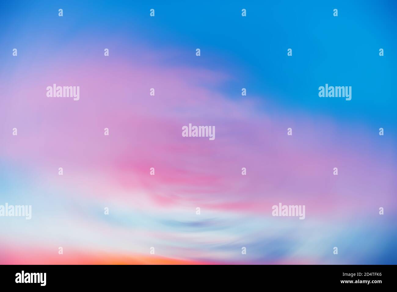 Beautiful backdrop of sunset sky with pink orange light clouds in blue ...