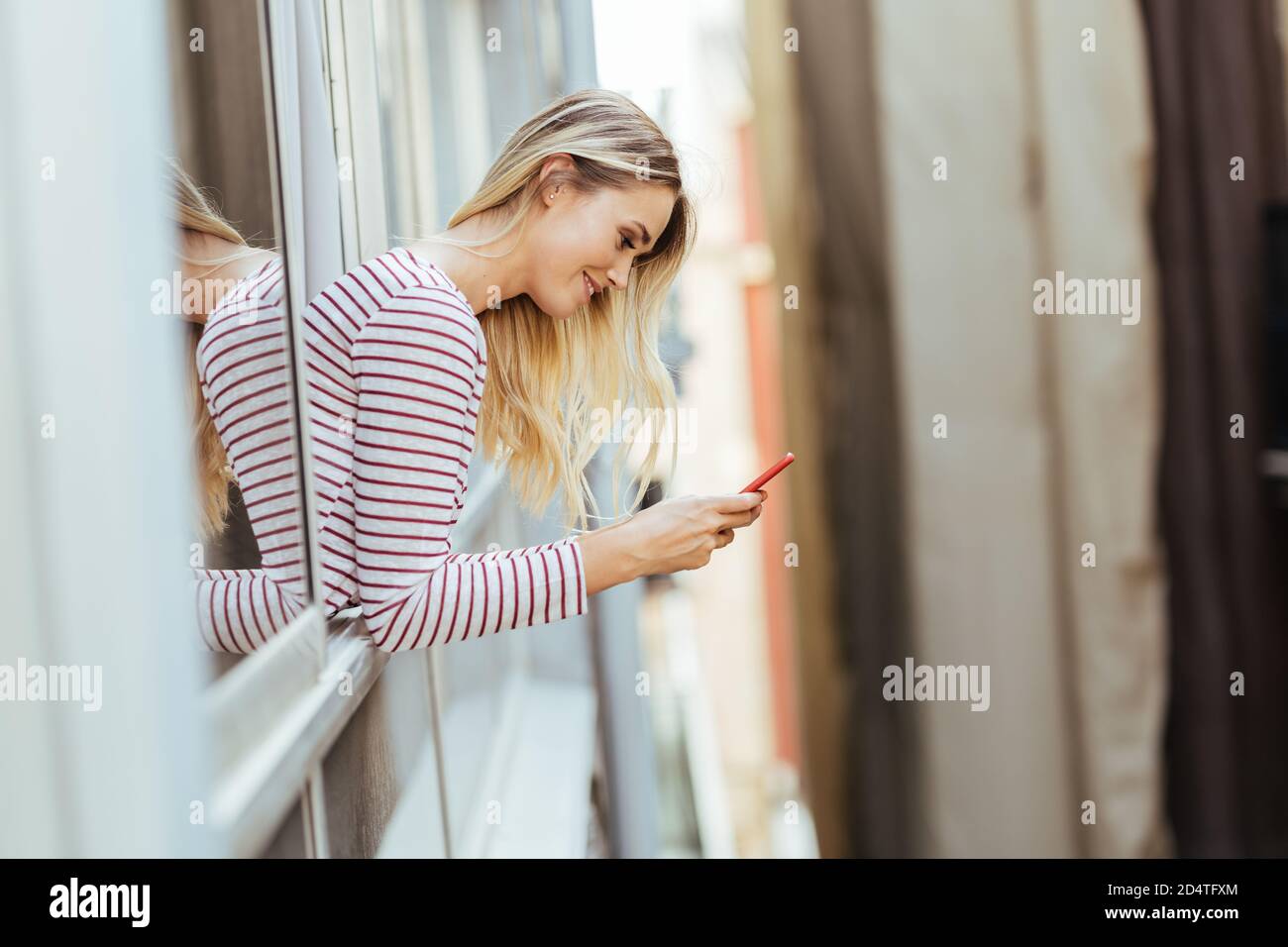 Leaning out the house window hi-res stock photography and images - Alamy