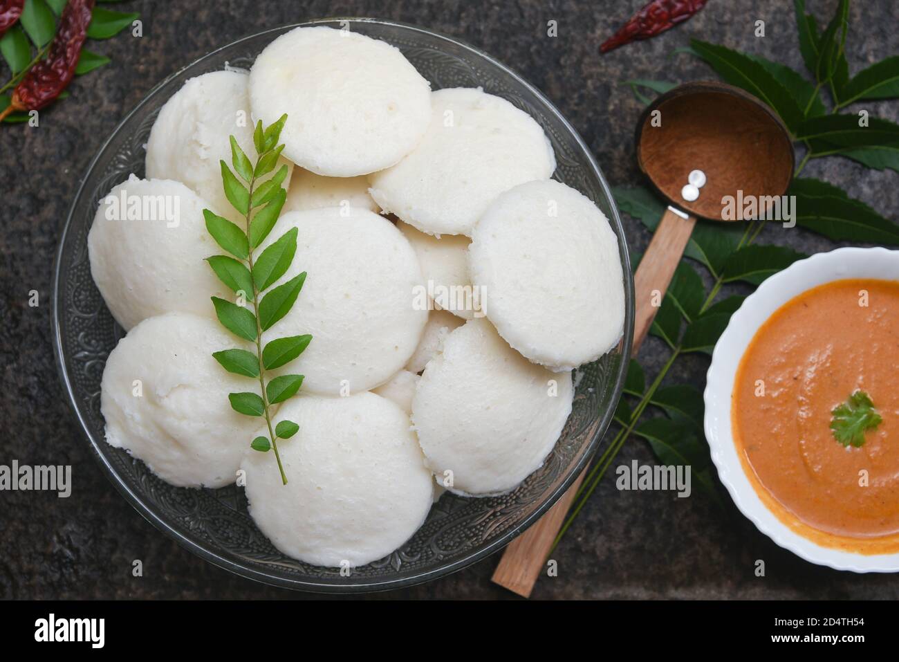 Indian idly served on traditional vegetarian food. Lots of many fresh ...