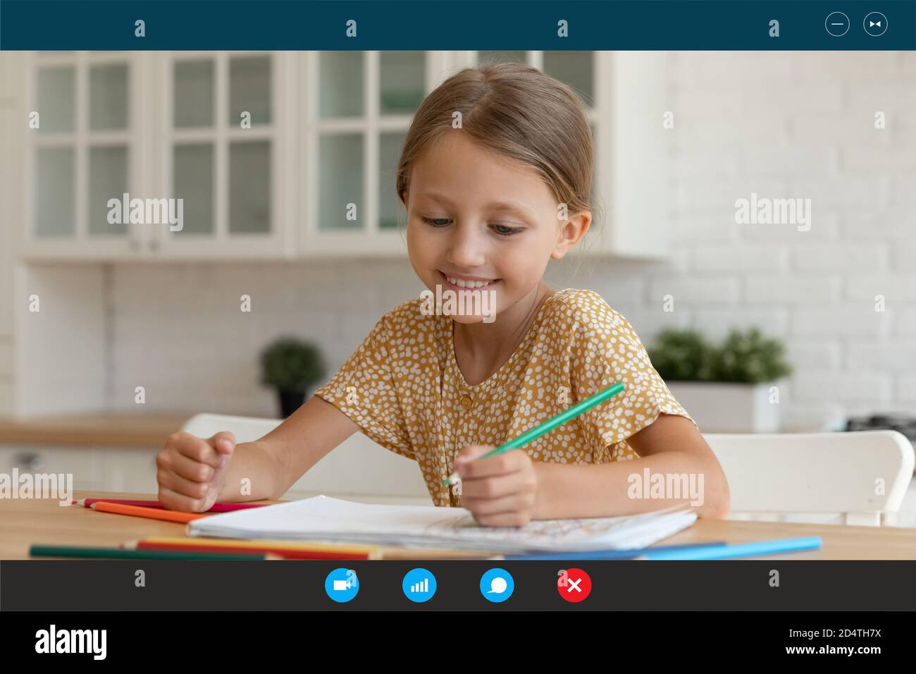 Smiling little girl talk on video call drawing Stock Photo - Alamy