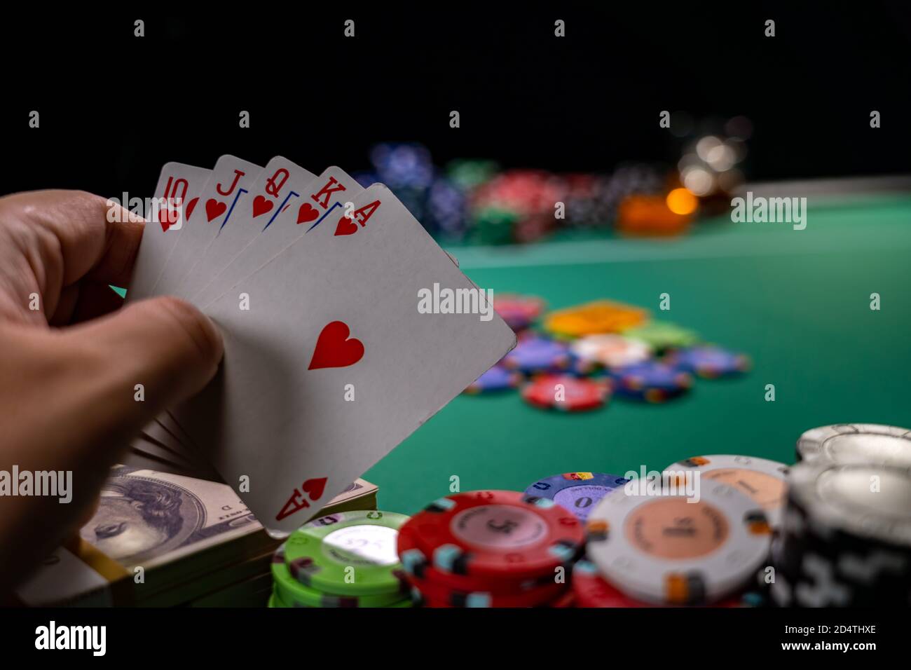 Man holding poker cards hi-res stock photography and images - Alamy