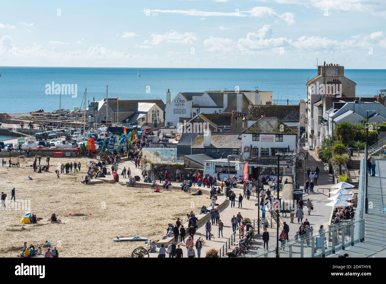 Lyme Regis, Dorset, UK. 11th Oct, 2020. UK Weather: Visitors and locals ...