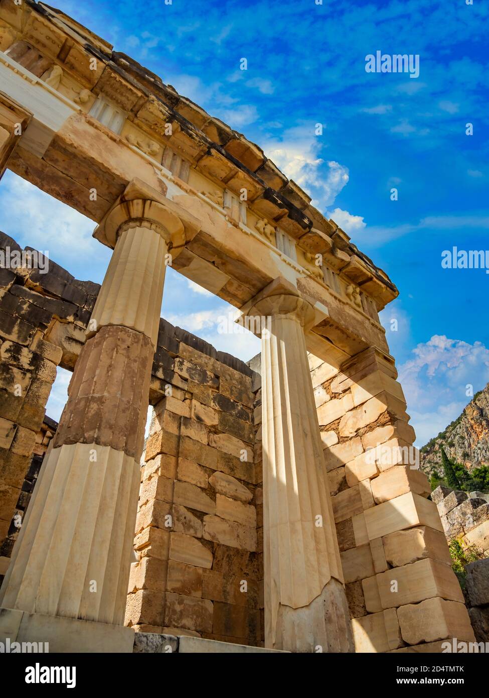 The ancient ruins of the temple of Apollo in Delphi, Greece Stock Photo ...