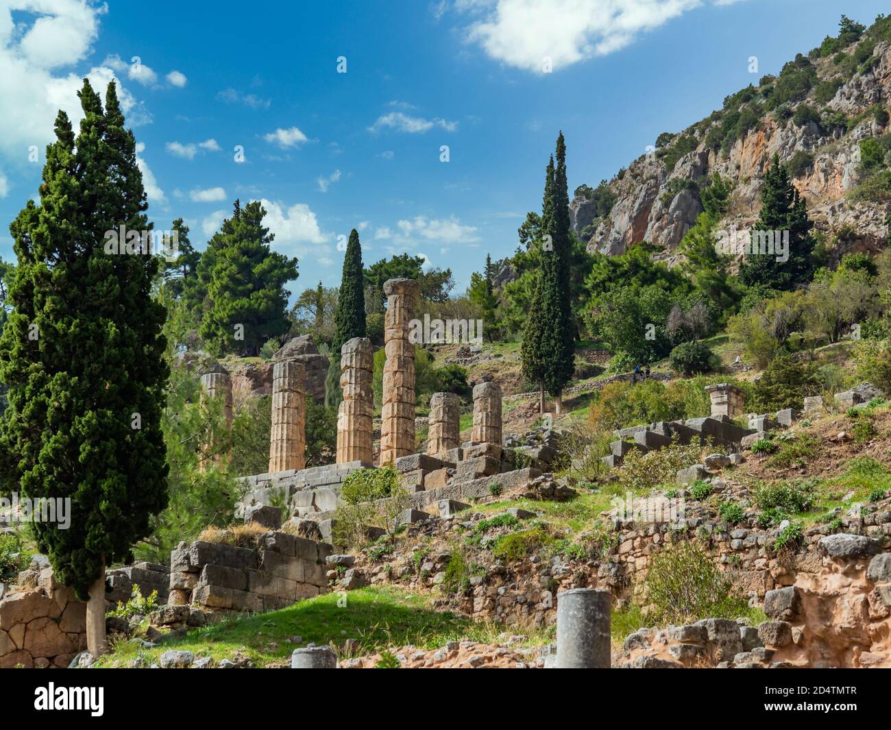 The ancient ruins of the temple of Apollo in Delphi, Greece Stock Photo ...