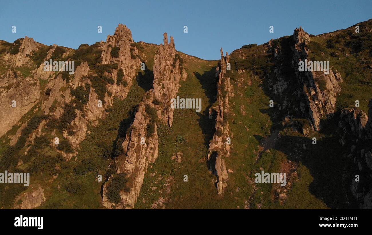Sharp ledges on the mountains Stock Photo - Alamy