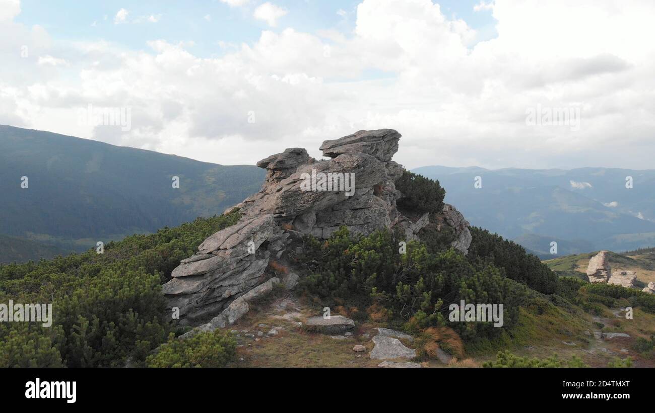 Craggy steep cliff with a lot of rough rocks Stock Photo - Alamy