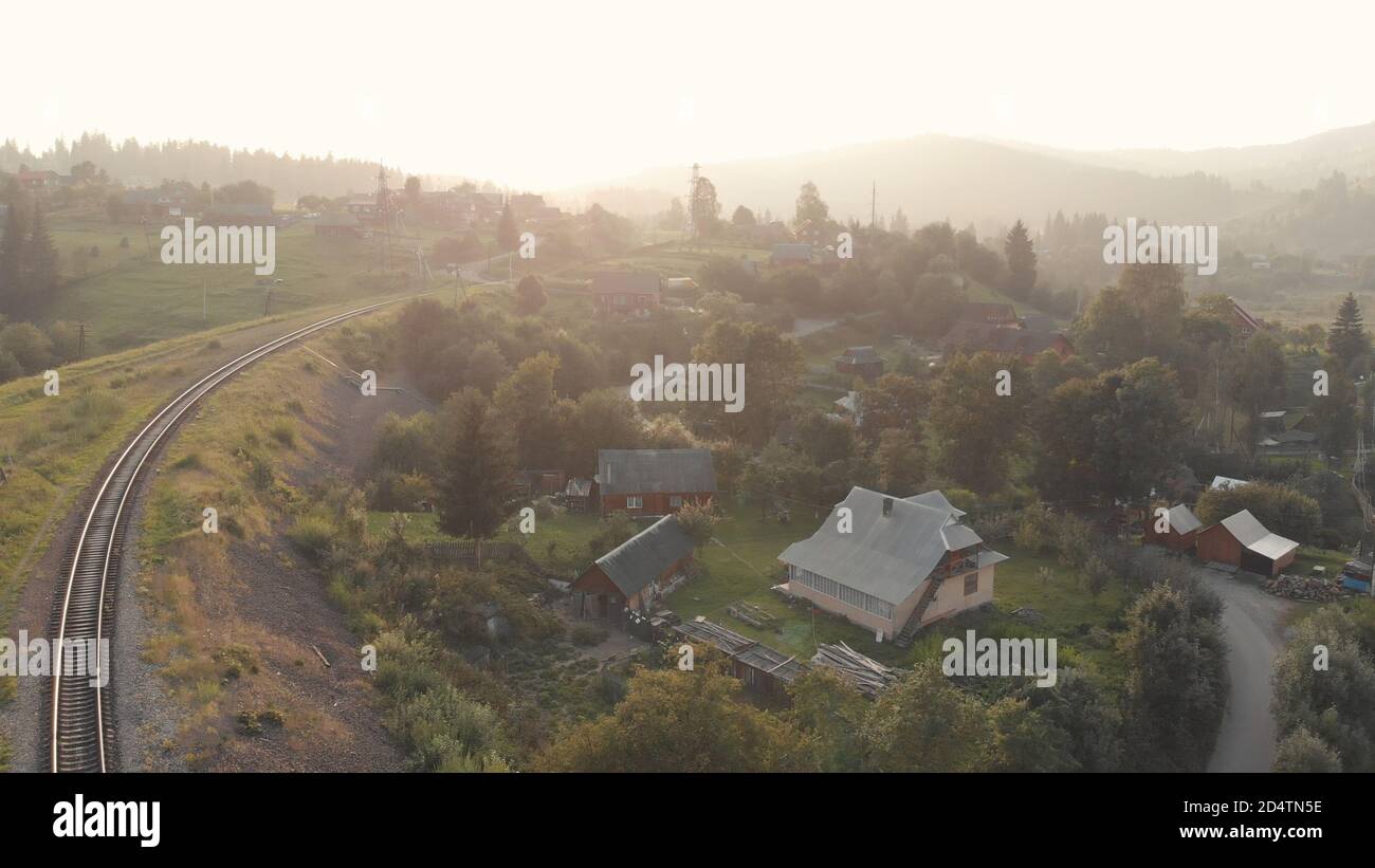 Light haze above the mountain village Stock Photo - Alamy