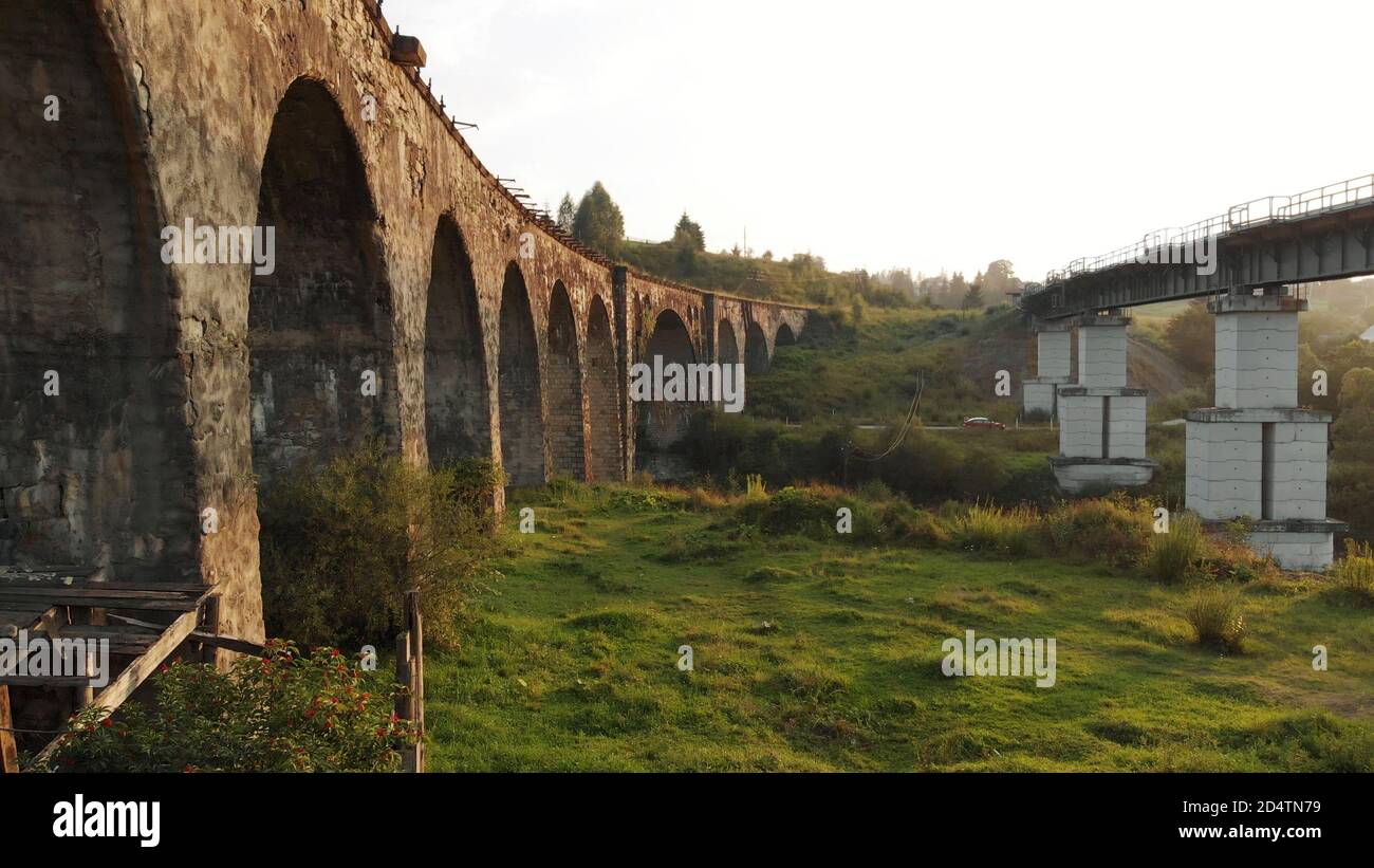 Closeup view of beautiful arches of bridge Stock Photo - Alamy
