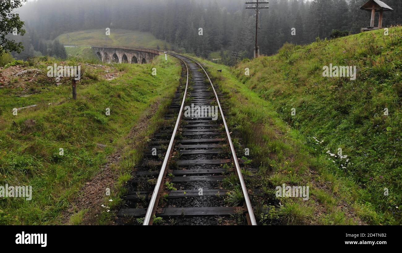 Amazing scenery of railroad on the green hills Stock Photo - Alamy