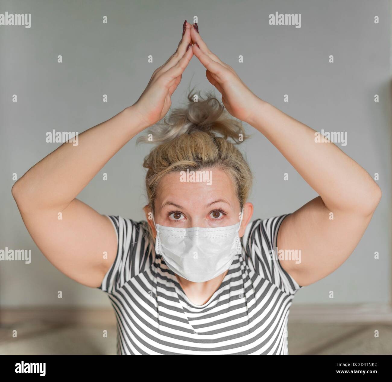 Woman in medicine mouth mask showed stay home stay safe. Be responsible ...