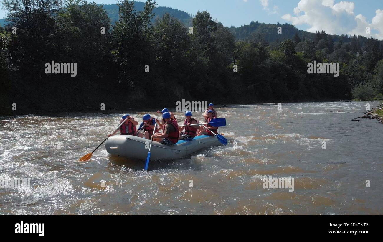 The inflatable boat on a fast stream of water Stock Photo - Alamy