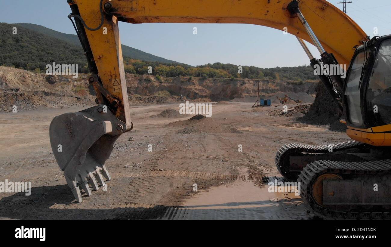 Earthmoving machine for excavation and dumping Stock Photo - Alamy