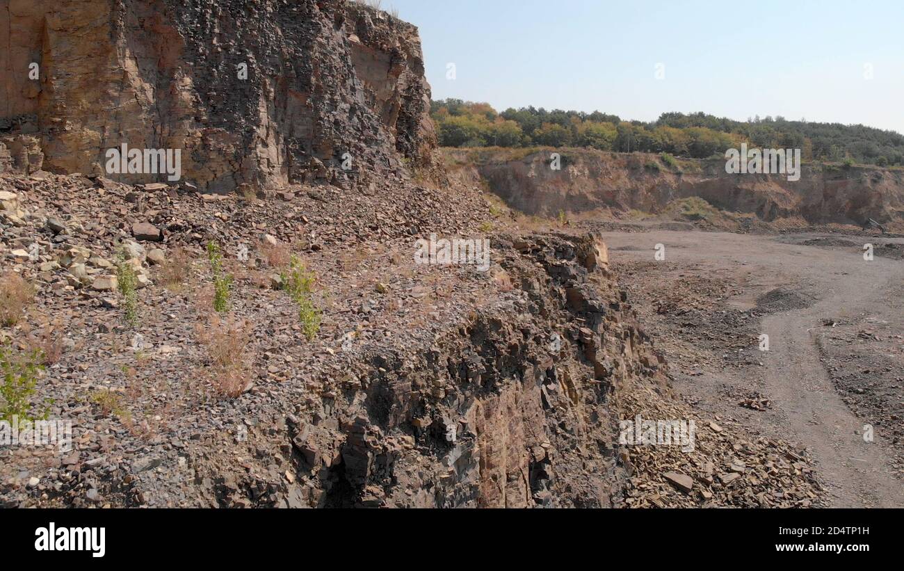 Rocky soil structure in a mining quarry Stock Photo - Alamy