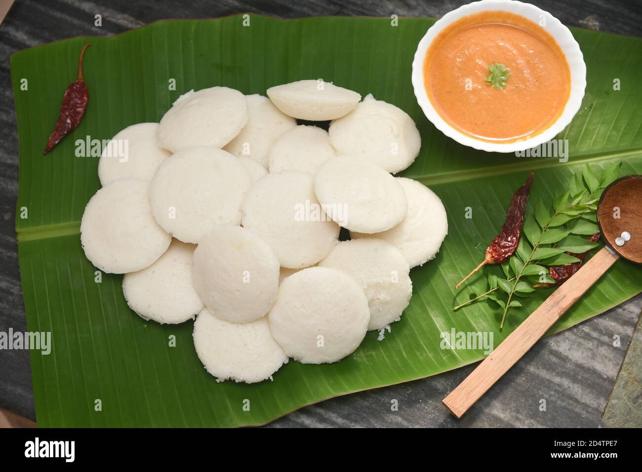 Indian idly served on traditional vegetarian food. Lots of many fresh ...