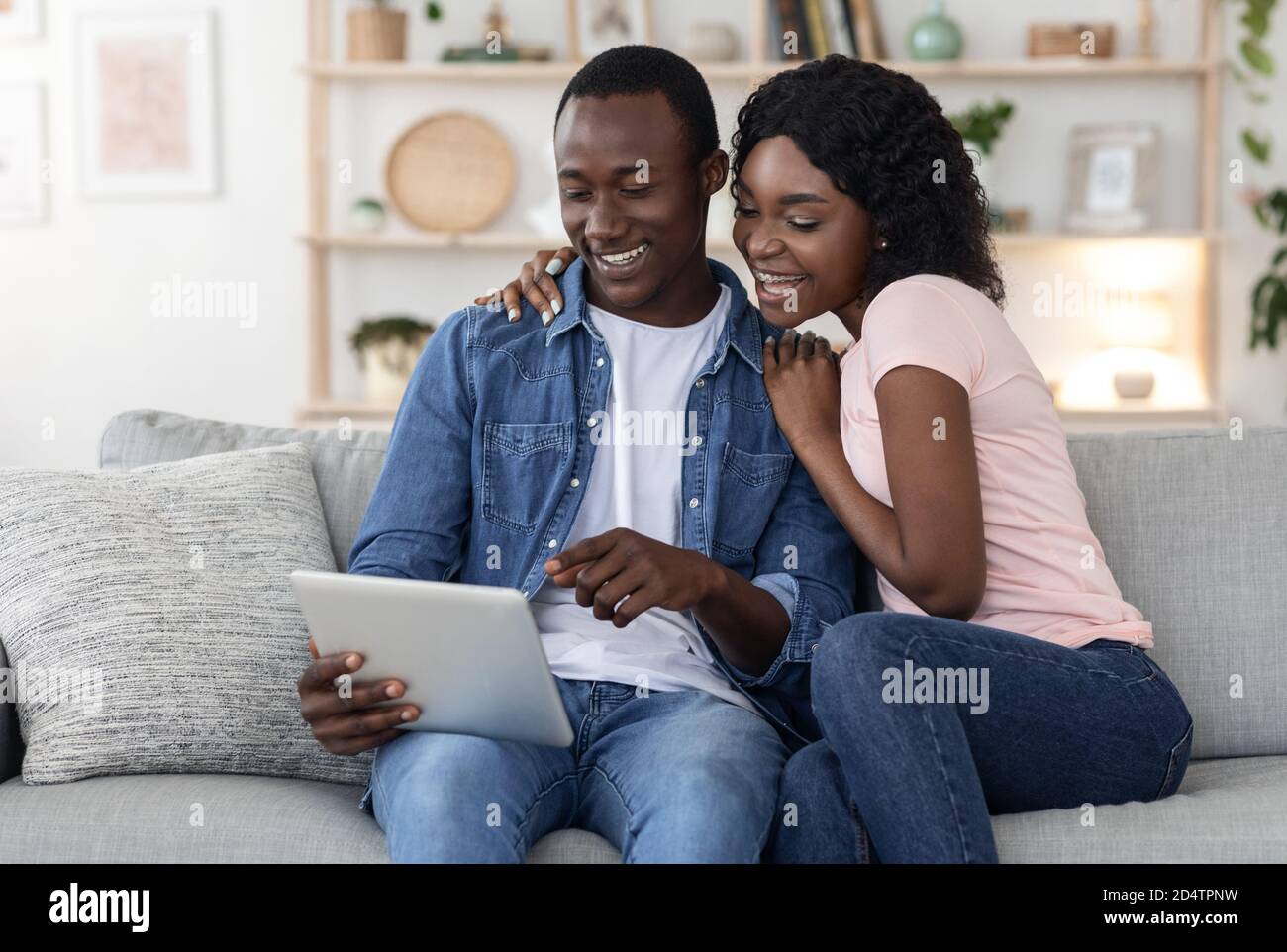 Joyful family in comfortable hi-res stock photography and images - Alamy