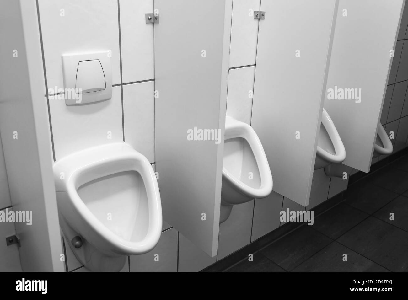Urinal partition Black and White Stock Photos & Images - Alamy
