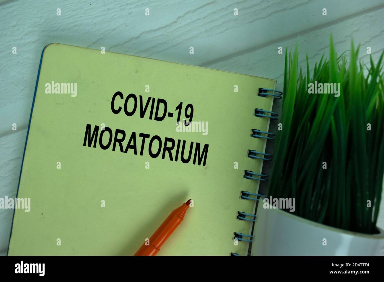 Covid-19 Moratorium write on a book isolated on office desk Stock Photo ...