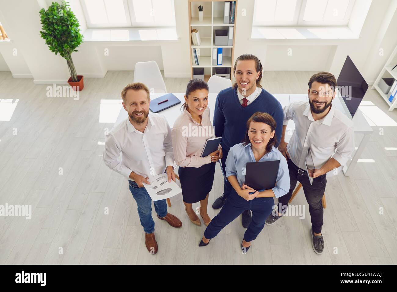 Happy sales people hi-res stock photography and images - Alamy