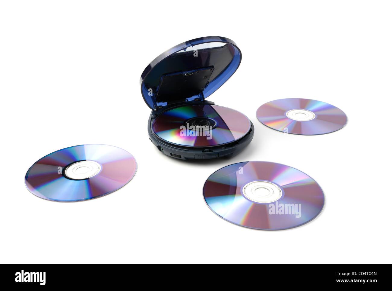 The CD player and old disks next to it are isolated on a white ...