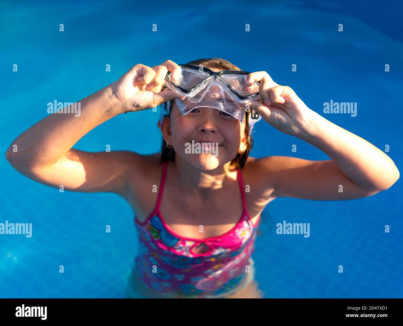 Diving girl in swimsuit hi-res stock photography and images - Alamy