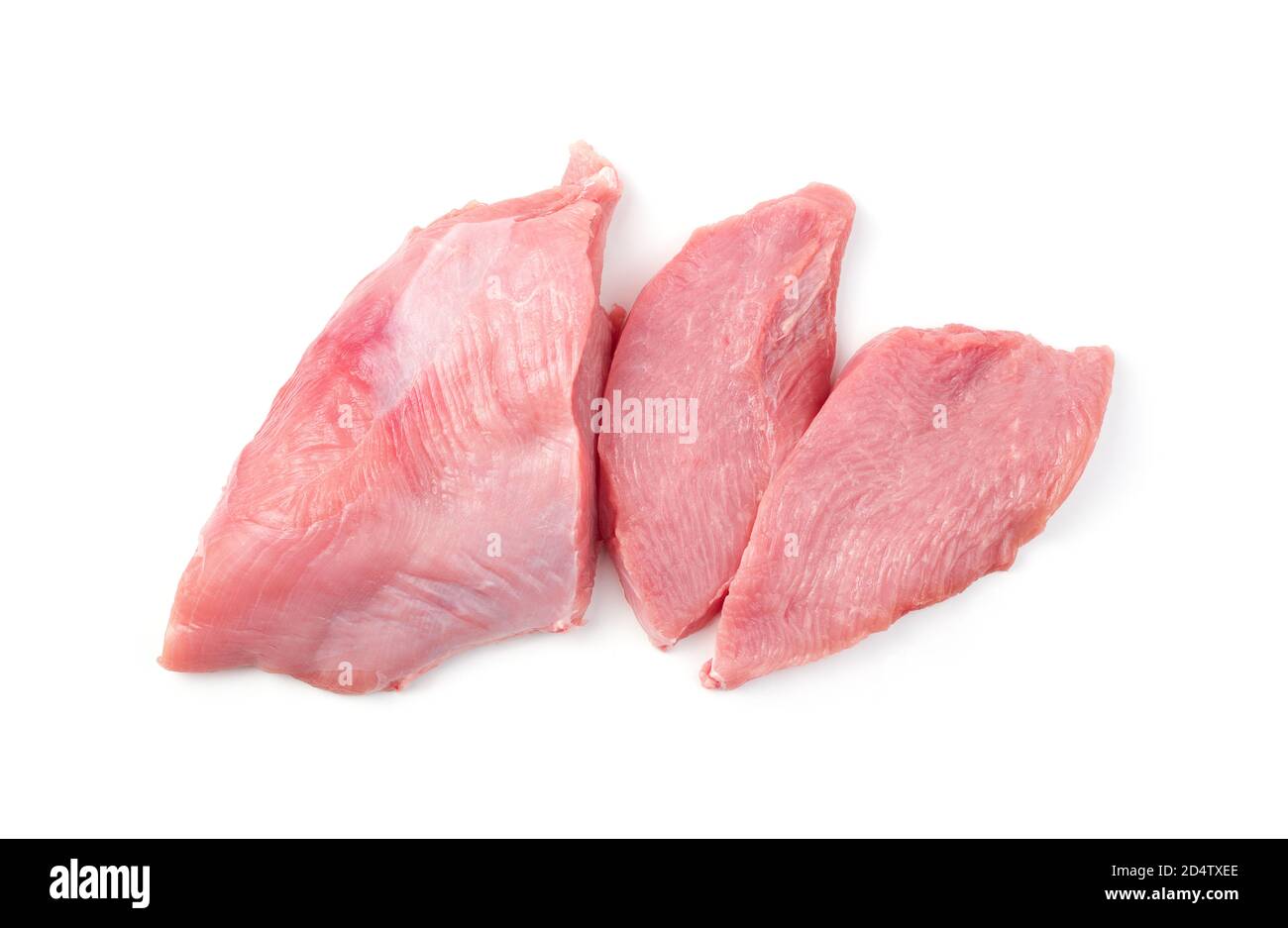 Turkey meat on a white background, large piece and small steaks Stock ...