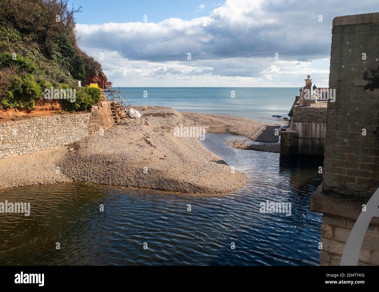View of the mouth of the River Sid at Sidmouth under the remnants of ...