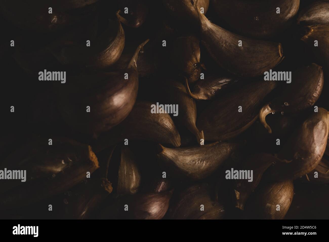 Roasted garlic cloves hi-res stock photography and images - Alamy