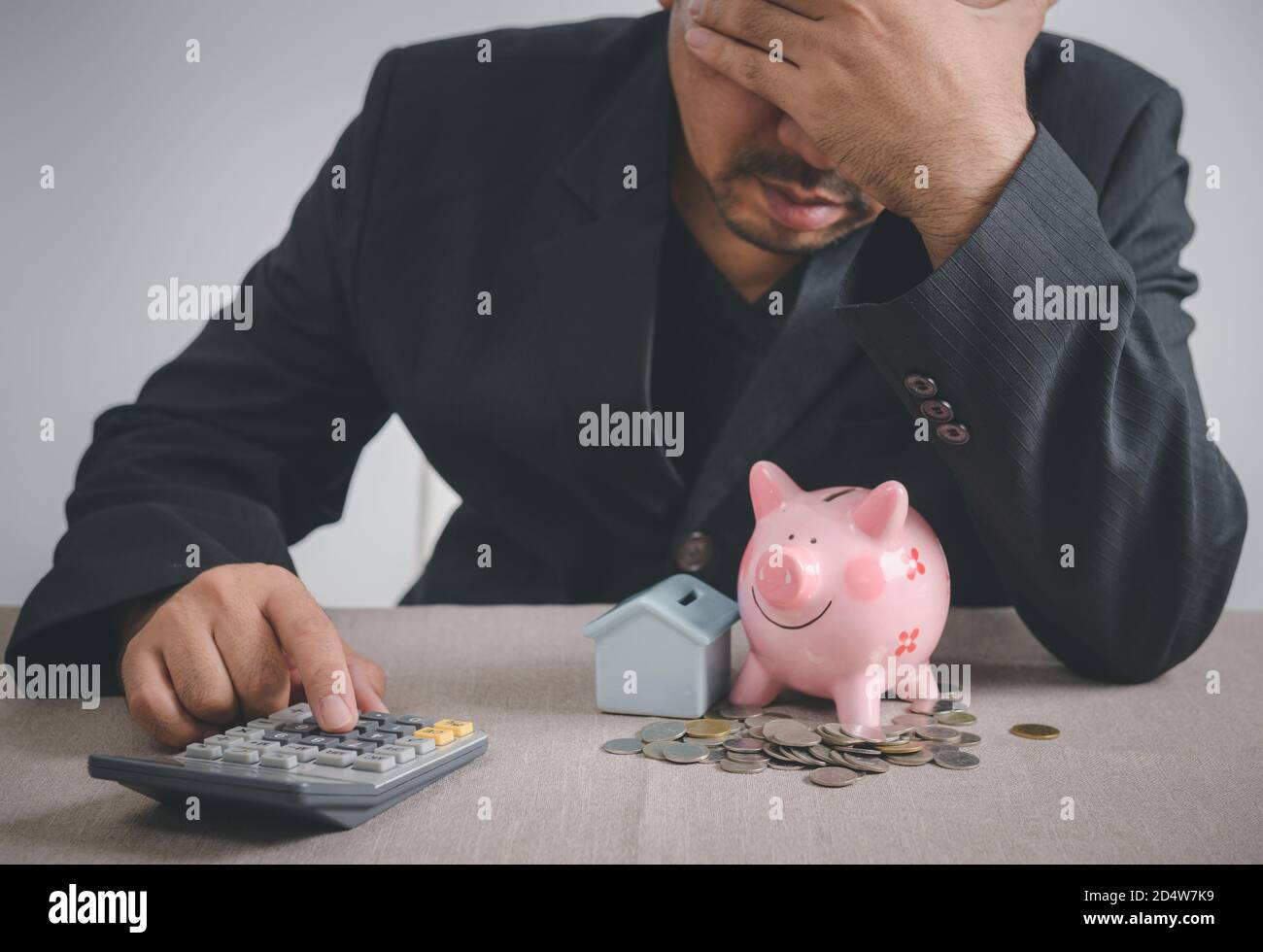 Businessman is stressed out of losing their jobs and insufficient ...