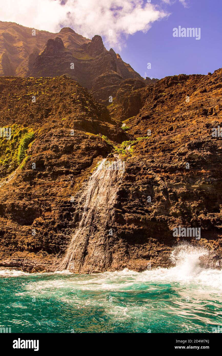 Vertical shot of the spectacular Na Pali coast cliffs on Kauai island ...