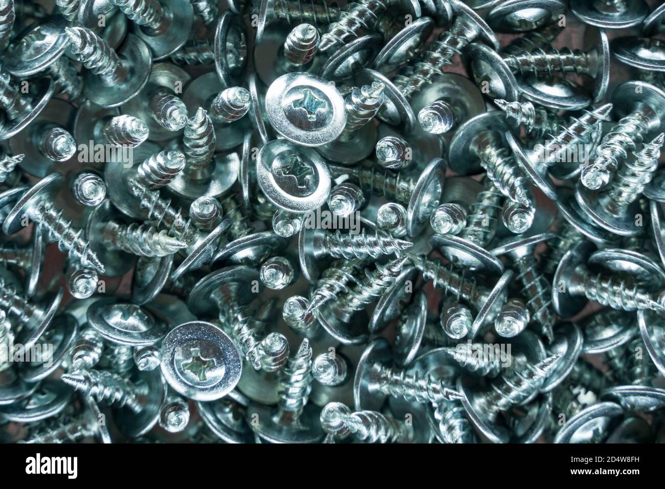 Metallic texture background. Screws and cogs. Tools for fixing and ...