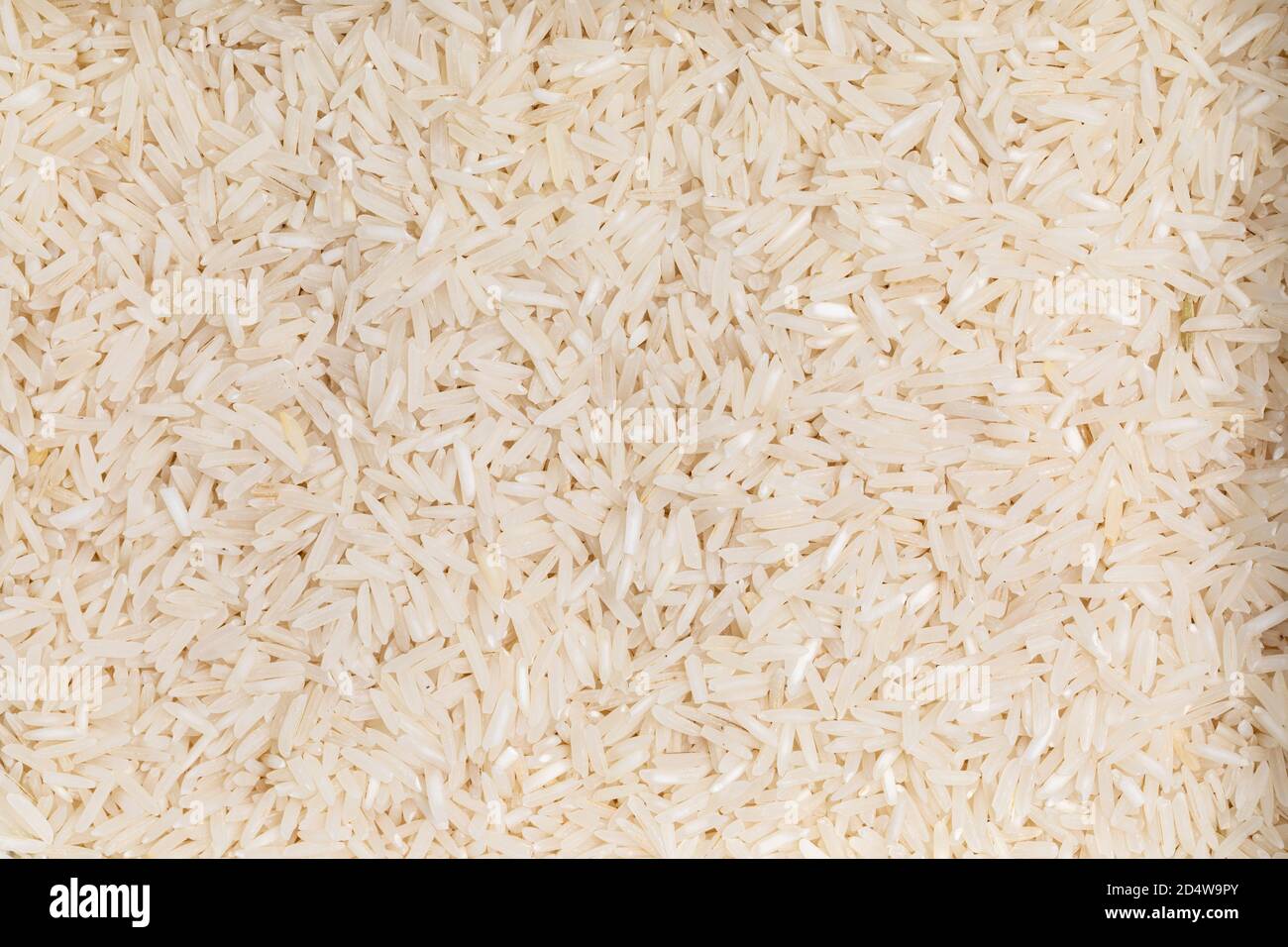 Top view full frame dry uncooked basmati rice Stock Photo - Alamy