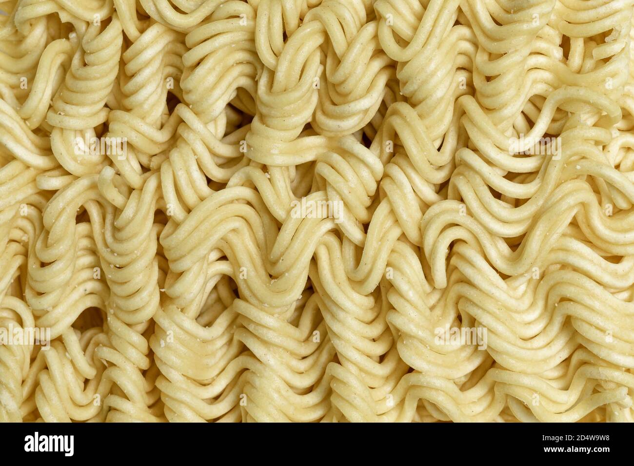 Top view full frame uncooked raw noodles Stock Photo - Alamy