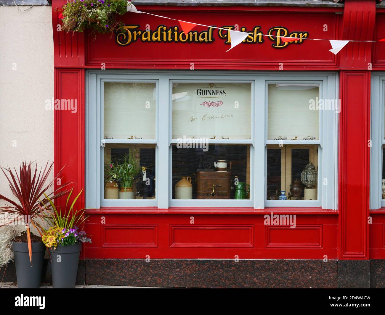 An Irish pub window Stock Photo - Alamy