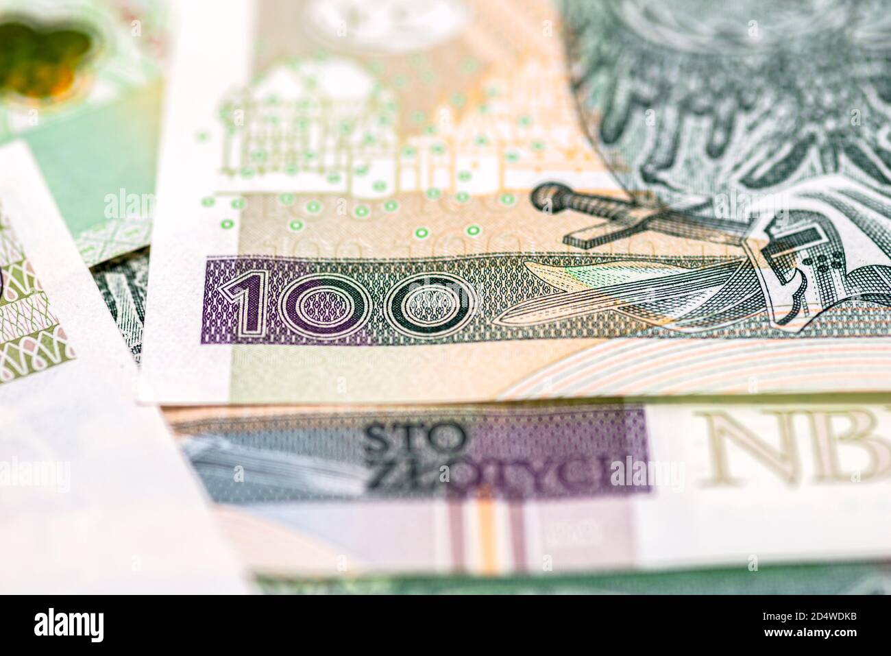 Macro photo of the rear side of a Polish 100 PLN banknote, close-up on ...