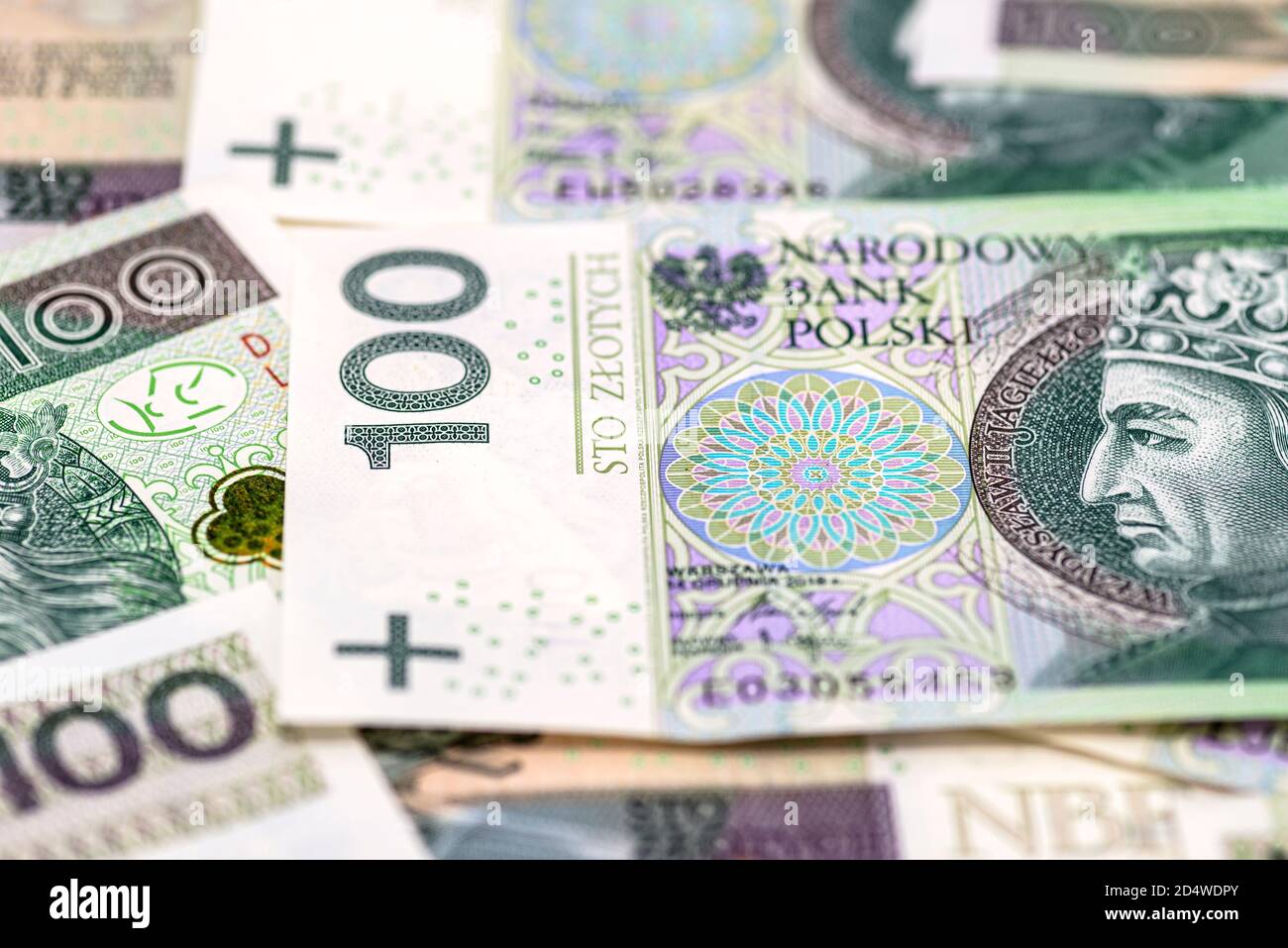 Macro photo of the front side of a Polish 100 PLN banknote, close-up on ...