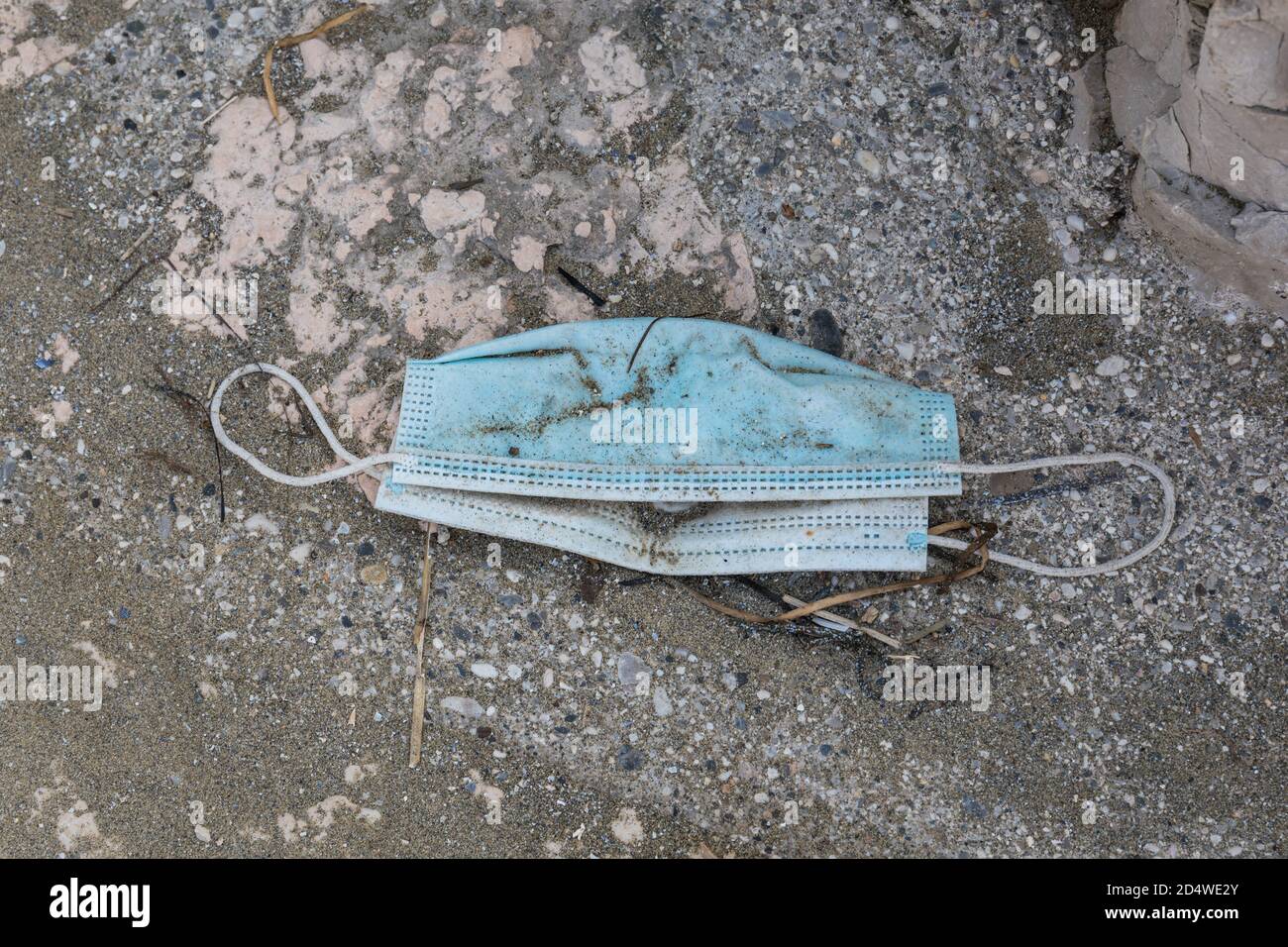 Used blue disposable medical mask hi-res stock photography and images ...
