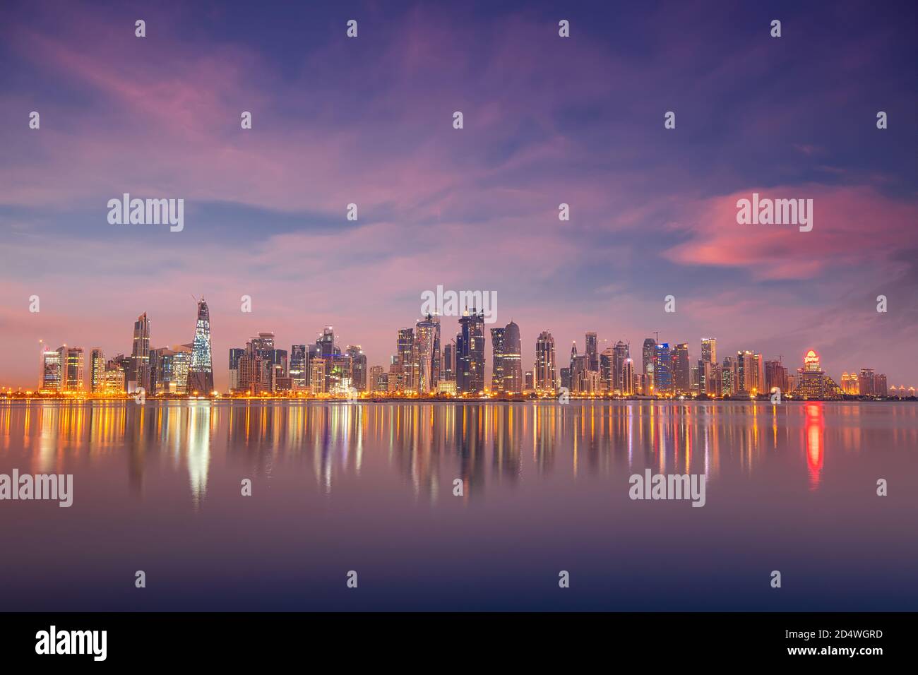 The skyline of Doha, Qatar during sunset Stock Photo - Alamy
